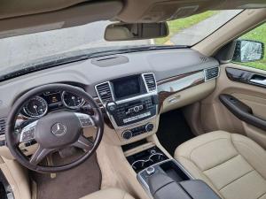 Black Mercedes-Benz ML 350 2014 in Kaunas, with an engine capacity of 2.99 L and mileage of 234 thousand km for 13990 €, photo 11 on AUTOMOTO.COM.LV