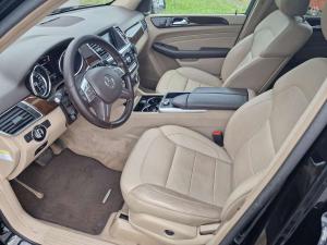 Black Mercedes-Benz ML 350 2014 in Kaunas, with an engine capacity of 2.99 L and mileage of 234 thousand km for 13990 €, photo 12 on AUTOMOTO.COM.LV