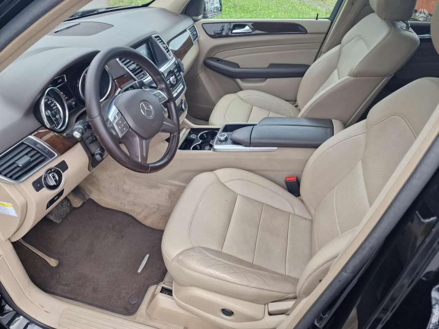 Black Mercedes-Benz ML 350 2014 in Kaunas, with an engine capacity of 2.99 L and mileage of 234 thousand km for 13990 €, photo 12 on AUTOMOTO.COM.LV