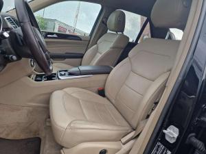 Black Mercedes-Benz ML 350 2014 in Kaunas, with an engine capacity of 2.99 L and mileage of 234 thousand km for 13990 €, photo 13 on AUTOMOTO.COM.LV
