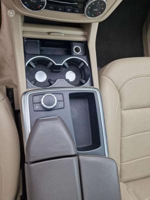 Black Mercedes-Benz ML 350 2014 in Kaunas, with an engine capacity of 2.99 L and mileage of 234 thousand km for 13990 €, photo 19 on AUTOMOTO.COM.LV
