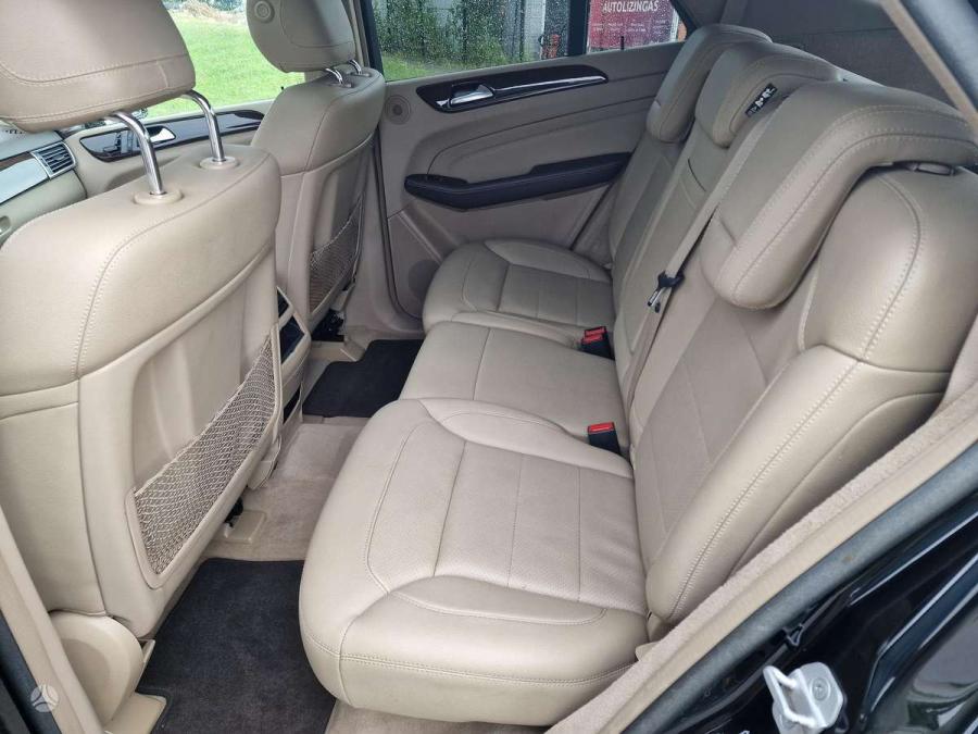 Black Mercedes-Benz ML 350 2014 in Kaunas, with an engine capacity of 2.99 L and mileage of 234 thousand km for 13990 €, photo 24 on AUTOMOTO.COM.LV