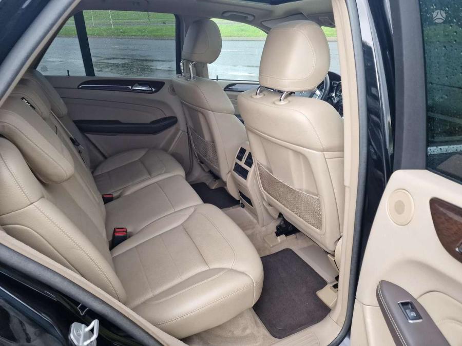 Black Mercedes-Benz ML 350 2014 in Kaunas, with an engine capacity of 2.99 L and mileage of 234 thousand km for 13990 €, photo 25 on AUTOMOTO.COM.LV