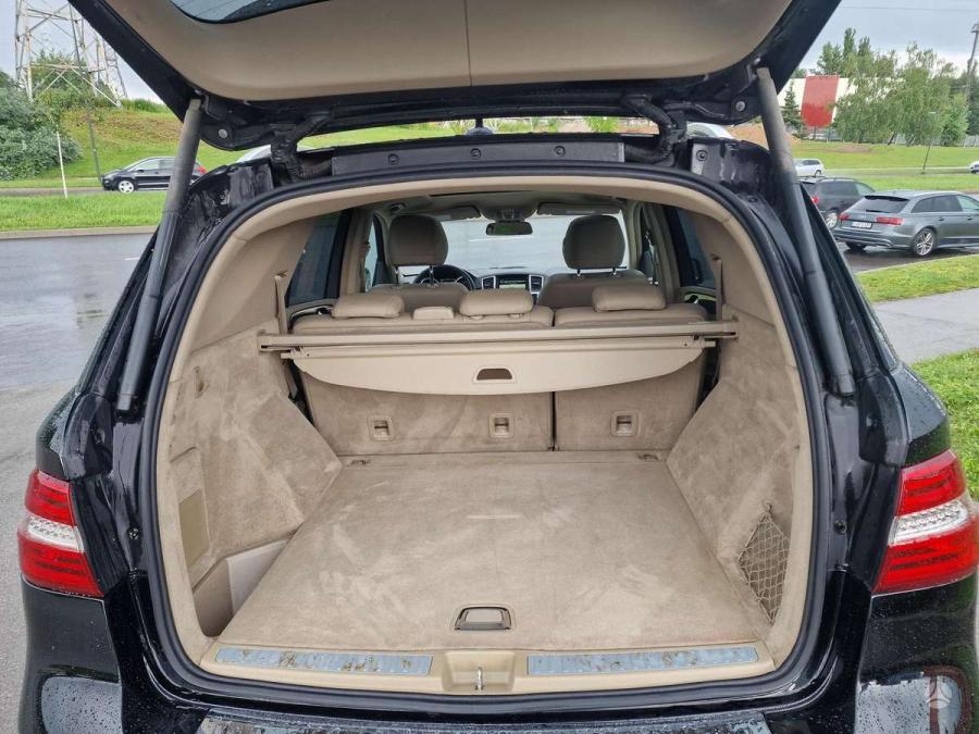 Black Mercedes-Benz ML 350 2014 in Kaunas, with an engine capacity of 2.99 L and mileage of 234 thousand km for 13990 €, photo 26 on AUTOMOTO.COM.LV