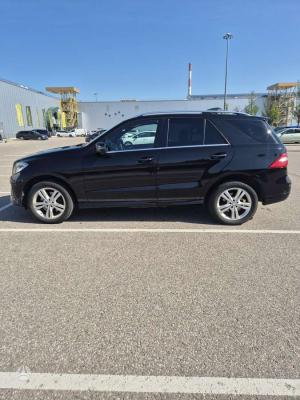 Black Mercedes-Benz ML 350 2014 in Vilnius, with an engine capacity of 2.99 L and mileage of 250 thousand km for 11999 €, photo  on AUTOMOTO.COM.LV