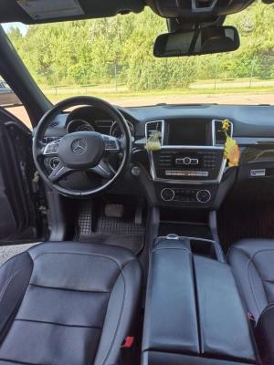 Black Mercedes-Benz ML 350 2014 in Vilnius, with an engine capacity of 2.99 L and mileage of 250 thousand km for 11999 €, photo 6 on AUTOMOTO.COM.LV