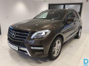 Brown Mercedes-Benz ML 350 2013 in Riga, with an engine capacity of 3.00 L and mileage of 217 thousand km for 16990 €, photo 3 on AUTOMOTO.COM.LV