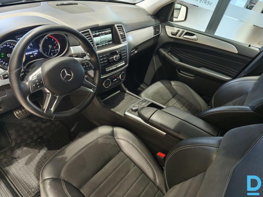 Brown Mercedes-Benz ML 350 2013 in Riga, with an engine capacity of 3.00 L and mileage of 217 thousand km for 16990 €, photo 7 on AUTOMOTO.COM.LV