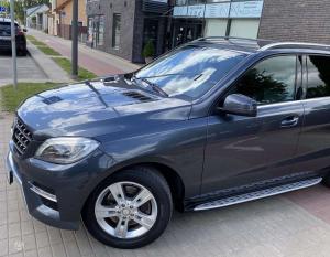 Grey Mercedes-Benz ML 350 2013 in Marijampole, with an engine capacity of 2.99 L and mileage of 260 thousand km for 14850 €, photo 13 on AUTOMOTO.COM.LV