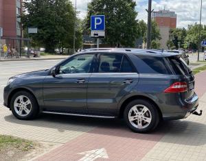 Grey Mercedes-Benz ML 350 2013 in Marijampole, with an engine capacity of 2.99 L and mileage of 260 thousand km for 14850 €, photo 16 on AUTOMOTO.COM.LV