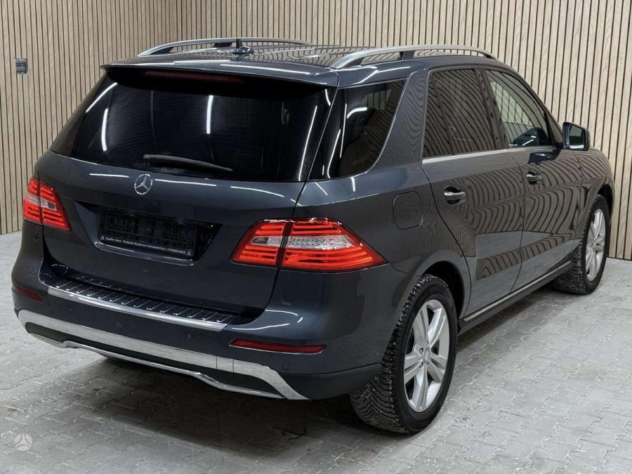 Grey Mercedes-Benz ML 350 2014 in Marijampole, with an engine capacity of 2.99 L and mileage of 291 thousand km for 16500 €, photo 12 on AUTOMOTO.COM.LV