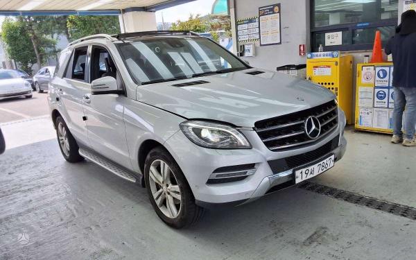 Grey Mercedes-Benz ML 350 2015 in Kaunas, with an engine capacity of 2.99 L and mileage of 229 thousand km for 12400 €, photo 1 on AUTOMOTO.COM.LV