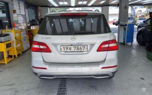 Grey Mercedes-Benz ML 350 2015 in Kaunas, with an engine capacity of 2.99 L and mileage of 229 thousand km for 12400 €, photo 6 on AUTOMOTO.COM.LV