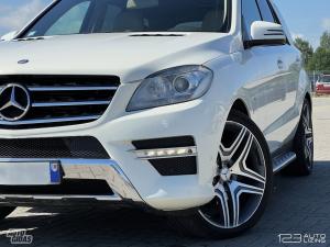 White Mercedes-Benz ML 350 2011 in Taurage, with an engine capacity of 3.00 L and mileage of 351 thousand km for 11700 €, photo 4 on AUTOMOTO.COM.LV