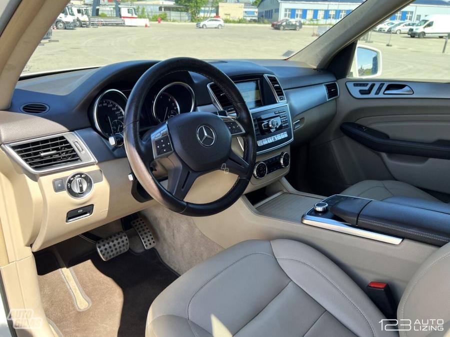 White Mercedes-Benz ML 350 2011 in Taurage, with an engine capacity of 3.00 L and mileage of 351 thousand km for 11700 €, photo 13 on AUTOMOTO.COM.LV