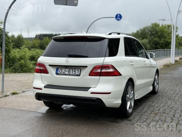 White Mercedes-Benz ML 350 2012 in Daugavpils, with an engine capacity of 3.00 L and mileage of 235 thousand km for 14650 €, photo 4 on AUTOMOTO.COM.LV