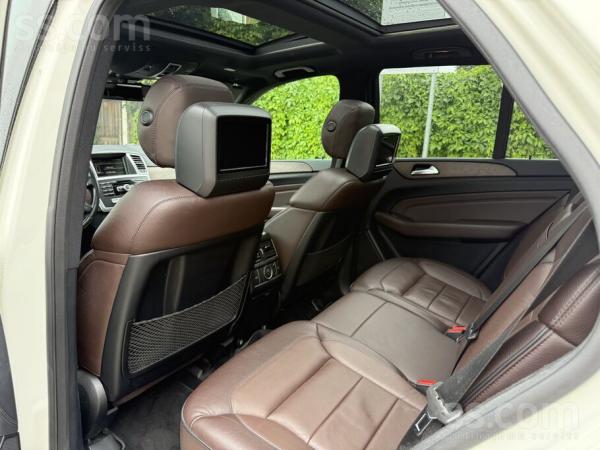 White Mercedes-Benz ML 350 2012 in Daugavpils, with an engine capacity of 3.00 L and mileage of 235 thousand km for 14650 €, photo 5 on AUTOMOTO.COM.LV