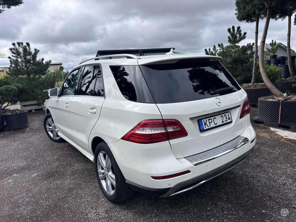 White Mercedes-Benz ML 350 2012 in Kaunas, with an engine capacity of 2.99 L and mileage of 281 thousand km for 14300 €, photo 2 on AUTOMOTO.COM.LV