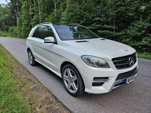 White Mercedes-Benz ML 350 2012 in Kaunas, with an engine capacity of 2.99 L and mileage of 180 thousand km for 15499 €, photo 8 on AUTOMOTO.COM.LV