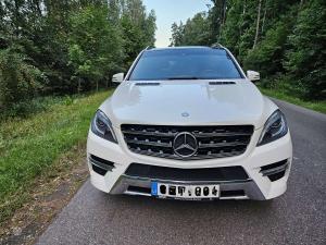 White Mercedes-Benz ML 350 2012 in Kaunas, with an engine capacity of 2.99 L and mileage of 180 thousand km for 15499 €, photo 9 on AUTOMOTO.COM.LV