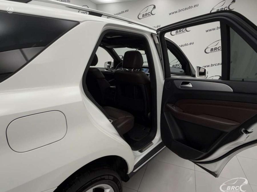 White Mercedes-Benz ML 350 2013 in Vilnius, with an engine capacity of 2.99 L and mileage of 242 thousand km for 12500 €, photo 14 on AUTOMOTO.COM.LV