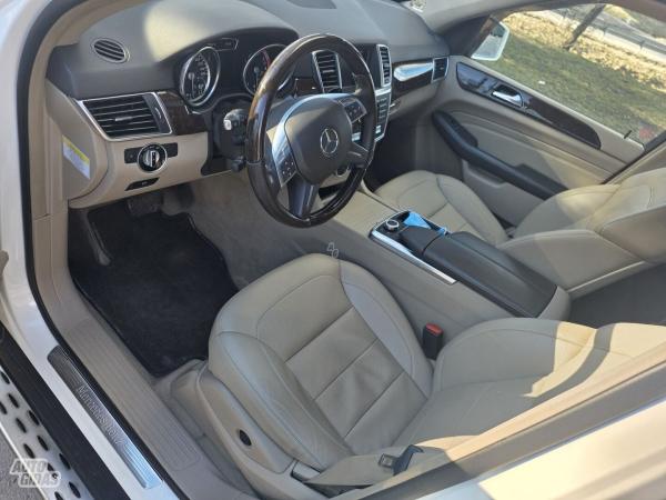White Mercedes-Benz ML 350 2013 in Kaunas, with an engine capacity of 3.50 L and mileage of 138 thousand km for 14499 €, photo 9 on AUTOMOTO.COM.LV