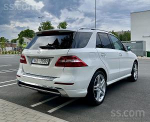 Белый Мерседес МЛ 350 2013 в Рига, объемом двигателя 3.00 л и пробегом 227 тыс. км за 15700 €, фото 9 на AUTOMOTO.COM.LV