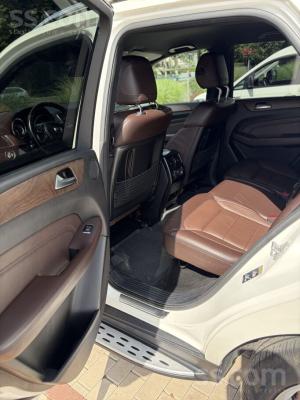 White Mercedes-Benz ML 350 2013 in Jurmala, with an engine capacity of 3.00 L and mileage of 188 thousand km for 21000 €, photo 18 on AUTOMOTO.COM.LV