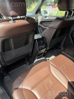 White Mercedes-Benz ML 350 2013 in Jurmala, with an engine capacity of 3.00 L and mileage of 188 thousand km for 21000 €, photo 19 on AUTOMOTO.COM.LV