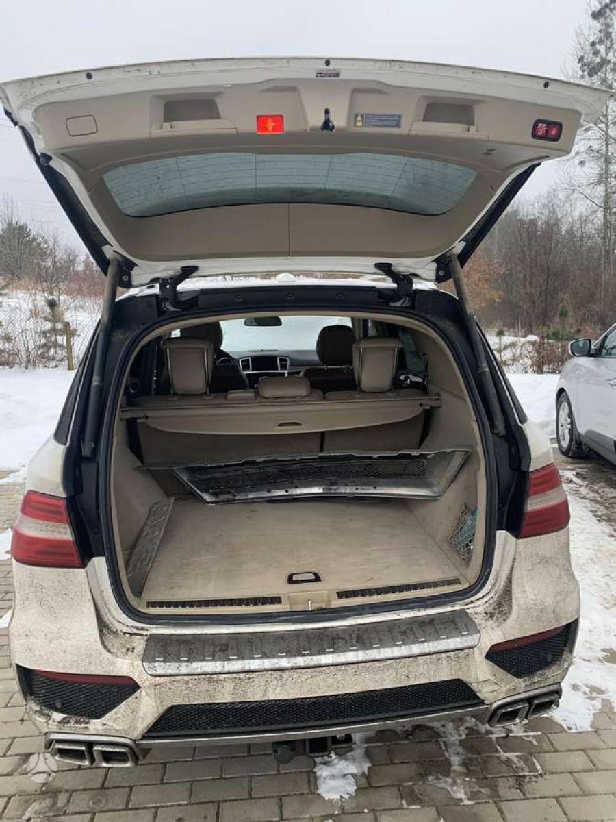White Mercedes-Benz ML 350 2015 in Prienai, with an engine capacity of 3.50 L and mileage of 180 thousand km for 13000 €, photo 12 on AUTOMOTO.COM.LV
