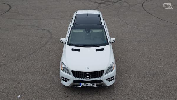 White Mercedes-Benz ML 350 2015 in Vilnius, with an engine capacity of 3.00 L and mileage of 120 thousand km for 21999 €, photo 3 on AUTOMOTO.COM.LV