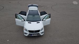 White Mercedes-Benz ML 350 2015 in Vilnius, with an engine capacity of 3.00 L and mileage of 120 thousand km for 21999 €, photo 5 on AUTOMOTO.COM.LV