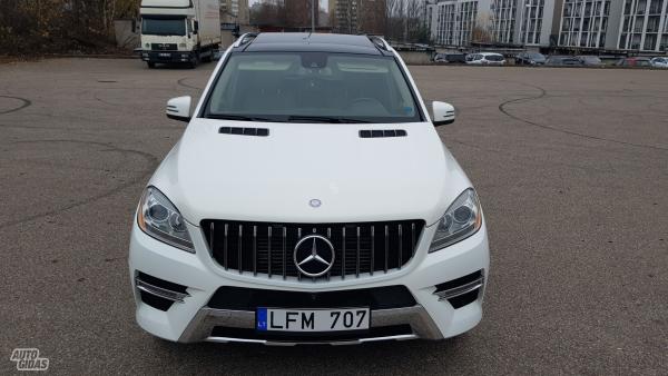 White Mercedes-Benz ML 350 2015 in Vilnius, with an engine capacity of 3.00 L and mileage of 120 thousand km for 21999 €, photo 7 on AUTOMOTO.COM.LV