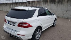 White Mercedes-Benz ML 350 2015 in Vilnius, with an engine capacity of 3.00 L and mileage of 120 thousand km for 21999 €, photo 9 on AUTOMOTO.COM.LV