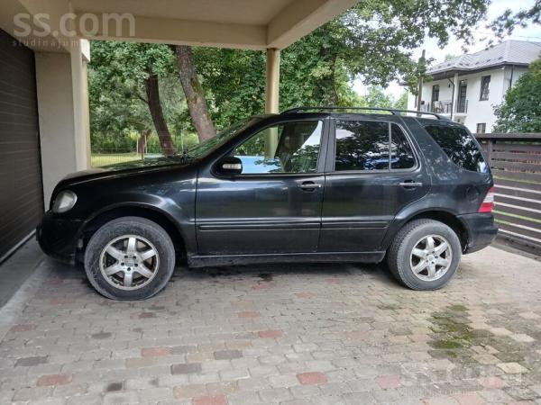 Melns Mercedes-Benz ml-400 2002 Rīga, ar dzinēja tilpumu 4.00 L un nobraukumu 0 tūkst. km par 2900 €, foto 9 vietnē AUTOMOTO.COM.LV