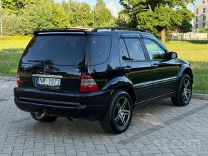 Black Mercedes-Benz ml-400 2003 in Riga, with an engine capacity of 4.00 L and mileage of 0 thousand km for 1990 €, photo 6 on AUTOMOTO.COM.LV