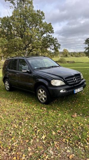 Black Mercedes-Benz ml-400 2003 in Ogre, with an engine capacity of 4.00 L and mileage of 328 thousand km for 1850 €, photo  on AUTOMOTO.COM.LV