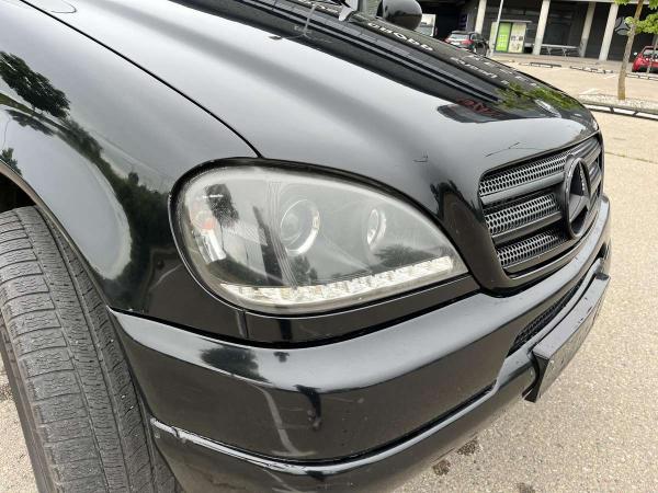 Black Mercedes-Benz ml-430 2000 in Vilnius, with an engine capacity of 4.27 L and mileage of 260 thousand km for 2750 €, photo 7 on AUTOMOTO.COM.LV