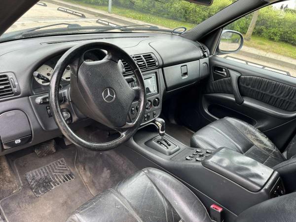 Black Mercedes-Benz ml-430 2000 in Vilnius, with an engine capacity of 4.27 L and mileage of 260 thousand km for 2750 €, photo 9 on AUTOMOTO.COM.LV
