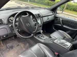 Black Mercedes-Benz ml-430 2000 in Vilnius, with an engine capacity of 4.27 L and mileage of 260 thousand km for 2750 €, photo 10 on AUTOMOTO.COM.LV