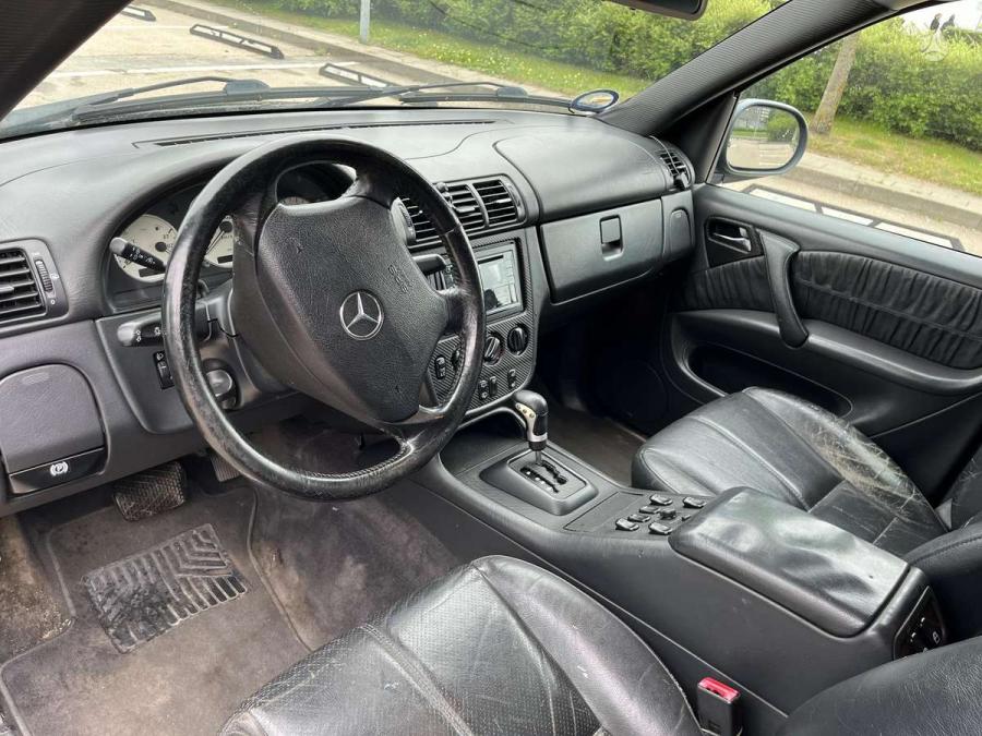 Black Mercedes-Benz ml-430 2000 in Vilnius, with an engine capacity of 4.27 L and mileage of 260 thousand km for 2750 €, photo 10 on AUTOMOTO.COM.LV