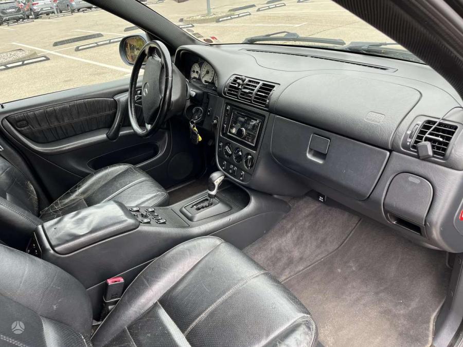 Black Mercedes-Benz ml-430 2000 in Vilnius, with an engine capacity of 4.27 L and mileage of 260 thousand km for 2750 €, photo 12 on AUTOMOTO.COM.LV