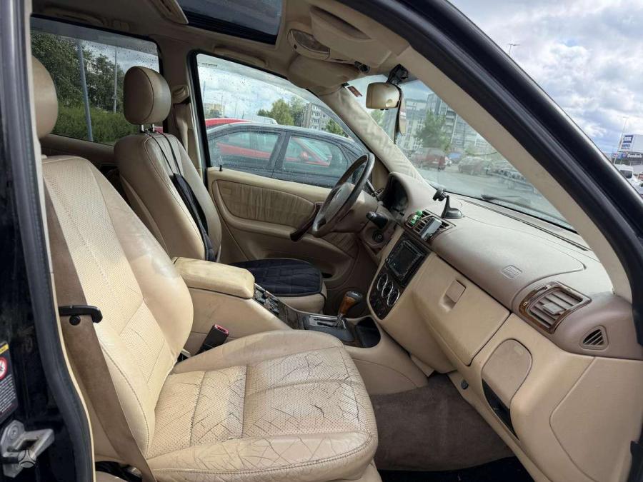 Black Mercedes-Benz ml-430 2000 in Vilnius, with an engine capacity of 4.30 L and mileage of 223 thousand km for 1450 €, photo 7 on AUTOMOTO.COM.LV