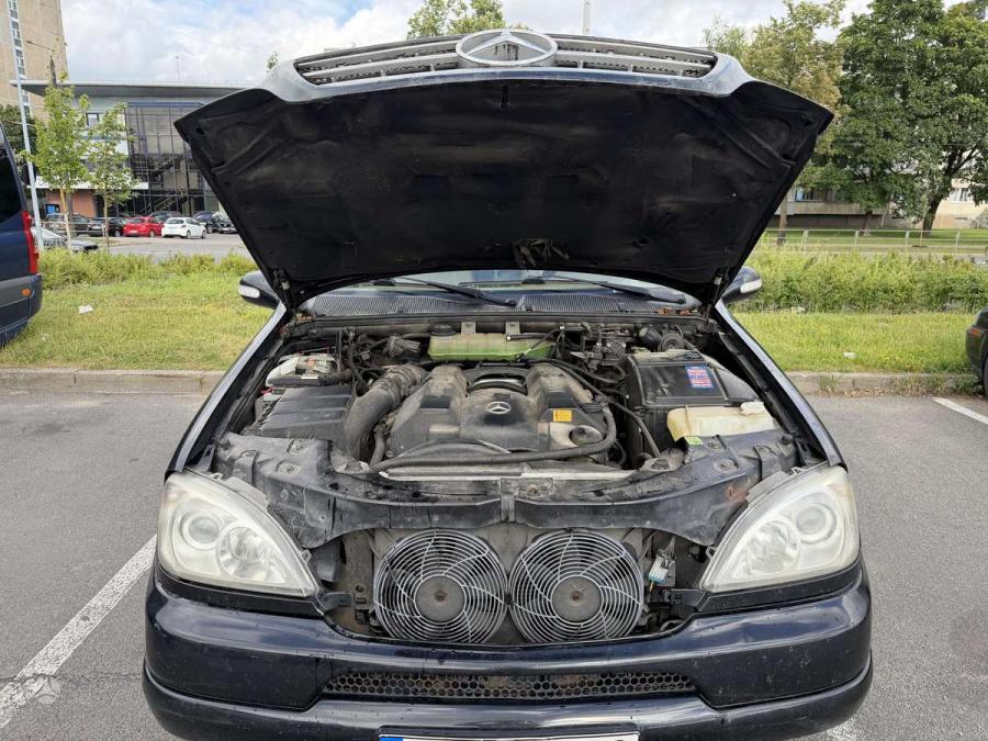 Black Mercedes-Benz ml-430 2000 in Vilnius, with an engine capacity of 4.30 L and mileage of 223 thousand km for 1450 €, photo 13 on AUTOMOTO.COM.LV