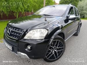Black Mercedes-Benz ml-450 2009 in Riga, with an engine capacity of 4.00 L and mileage of 310 thousand km for 5990 €, photo  on AUTOMOTO.COM.LV