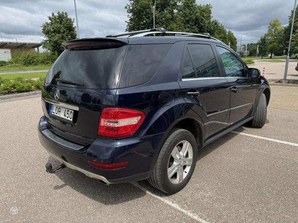 Blue Mercedes-Benz ml-450 2009 in Vilnius, with an engine capacity of 4.00 L and mileage of 290 thousand km for 9800 €, photo 4 on AUTOMOTO.COM.LV