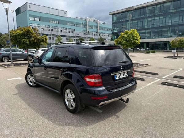 Blue Mercedes-Benz ml-450 2009 in Vilnius, with an engine capacity of 4.00 L and mileage of 290 thousand km for 9800 €, photo 5 on AUTOMOTO.COM.LV