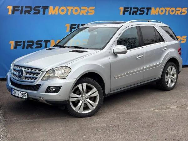 Grey Mercedes-Benz ml-450 2009 in Riga, with an engine capacity of 4.00 L and mileage of 289 thousand km for 5950 €, photo 1 on AUTOMOTO.COM.LV