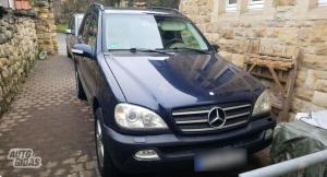 Blue Mercedes-Benz ml-500 2003 in Alytus, with an engine capacity of 5.00 L and mileage of 320 thousand km for 4100 €, photo  on AUTOMOTO.COM.LV
