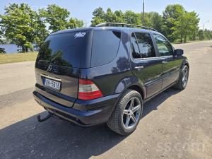 Синий Мерседес МЛ 500 2002 в Рига, объемом двигателя 5.00 л и пробегом 505 тыс. км за 3290 €, фото 4 на AUTOMOTO.COM.LV
